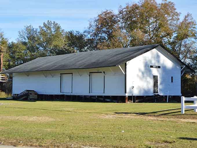This simple white building represents gathering places where faith and fellowship have anchored communities for generations.