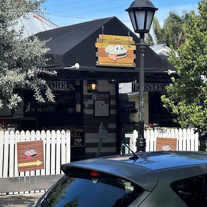 That happy clam logo grins for good reason&mdash;this tiny spot serves up New England classics with tropical flair.