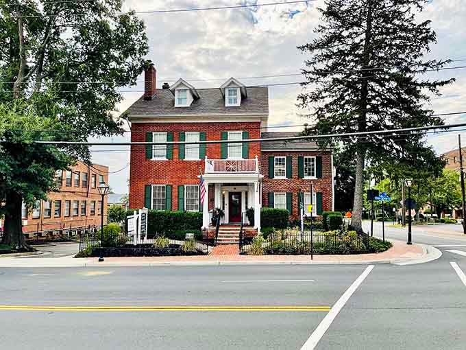 This stately brick building commands attention at the intersection, a reminder that good architecture never goes out of style.