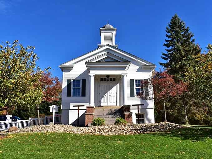 Autumn colors frame the classic Greek Revival building, showing how nature and architecture can create perfect harmony together.