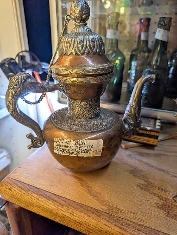 Ornate Tibetan teapot proving that functional objects can also be genuine works of decorative art.