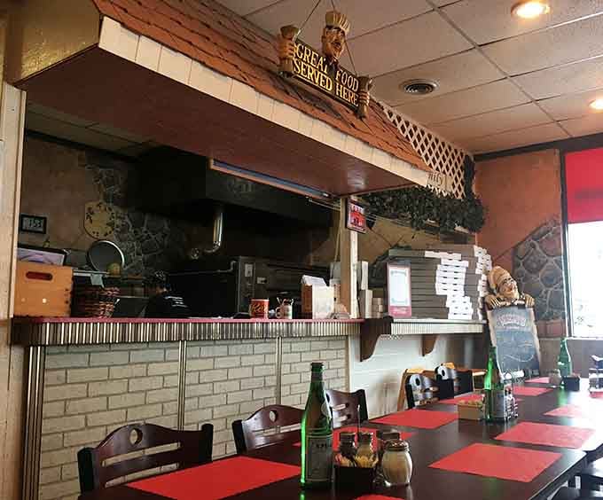 The counter where magic happens, complete with a sign reminding you that great food is served here daily.