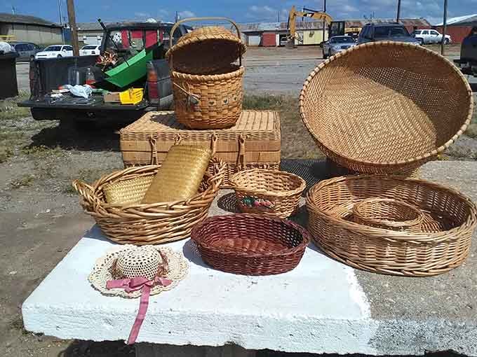 Wicker baskets piled high like someone raided every grandmother's attic and decided to share the bounty with grateful shoppers everywhere.
