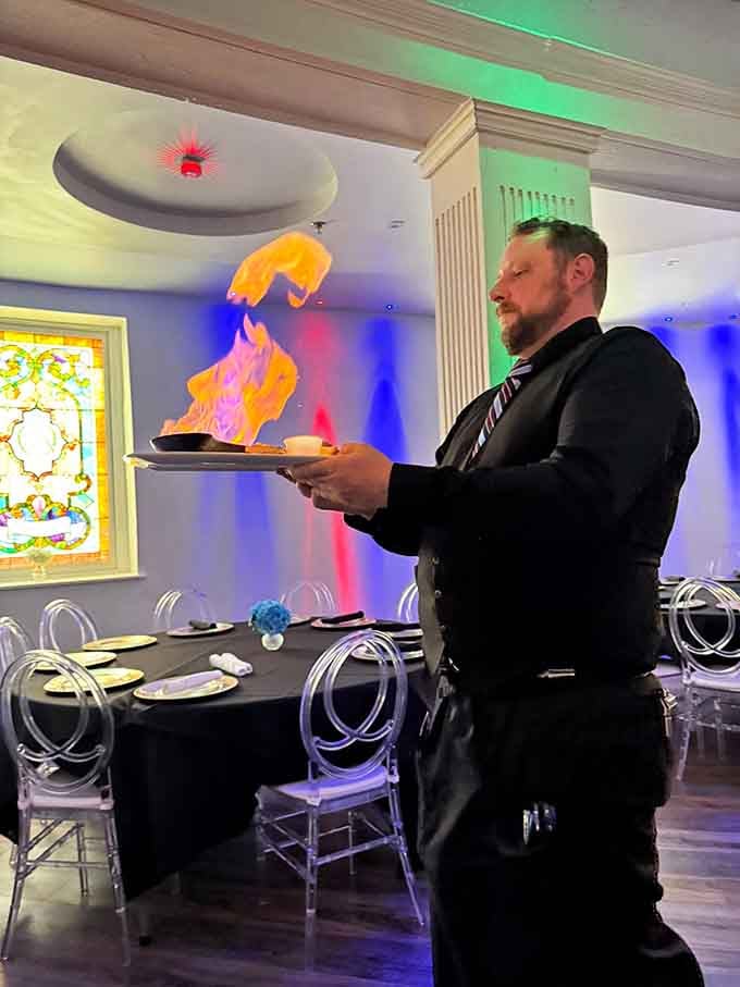 Flaming saganaki delivered tableside with theatrical flair, because cheese this good deserves its own spotlight and round of applause from admirers.