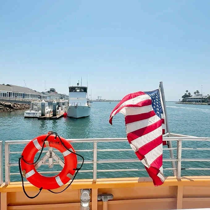 The boat waits patiently at dock, ready to whisk you across the bay whenever you're ready to escape.