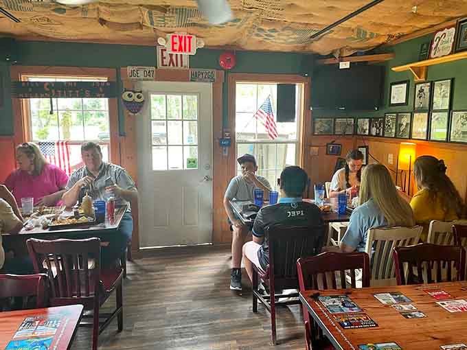 Happy diners enjoying their meals in a space that proves the best restaurants don't need fancy decor, just great food.