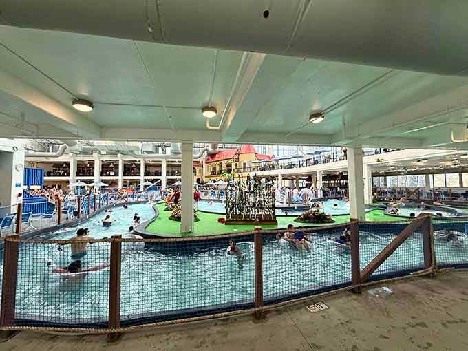 The lazy river winds through the facility like a gentle tour guide, carrying relaxed floaters past all the action.