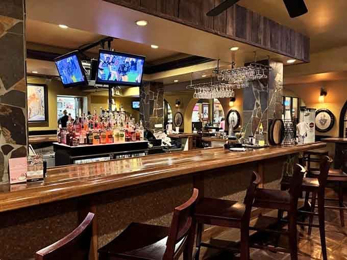 The bar area gleams with possibilities, from craft beers to cocktails, all served in a space that respects tradition.