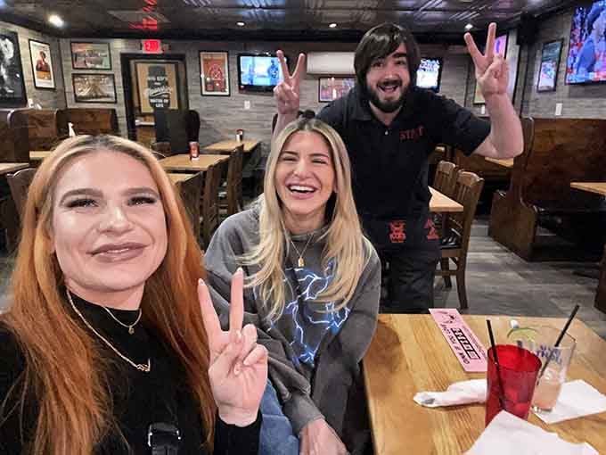 Genuine smiles and peace signs capture the friendly spirit that makes every visit feel special.