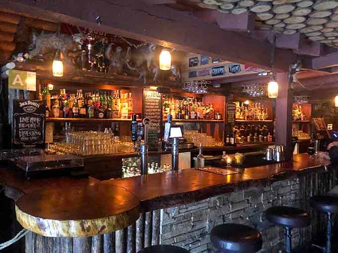 The bar counter gleams with possibility, backed by shelves of bottles that promise memorable evenings and fuzzy mornings.