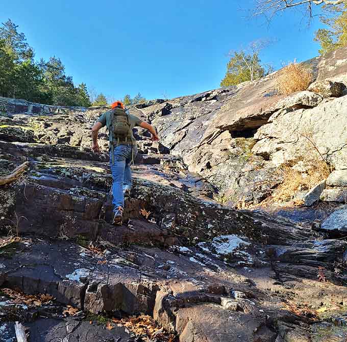 The trail requires some scrambling over rocks, but every careful step brings you closer to waterfall perfection ahead.