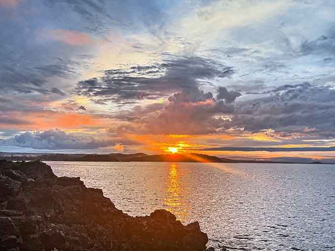 Sunset at Black Rocks delivers the kind of sky-and-water show that makes you forget to check your phone.