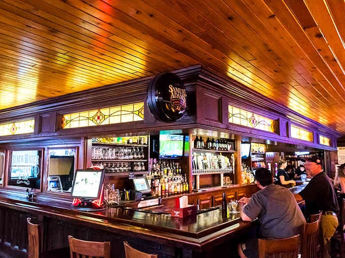 The handsome bar area invites solo diners and friends alike to settle in for exceptional food and drinks.