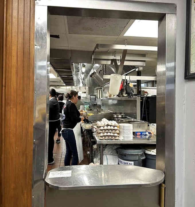 Through that kitchen window, you can watch breakfast being prepared with the precision of a symphony orchestra.
