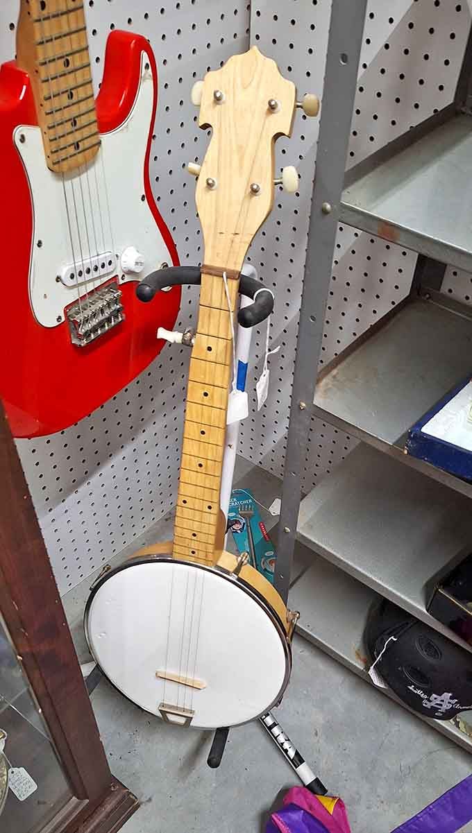 Musical instruments from banjos to guitars hang waiting for someone to give them a second act.