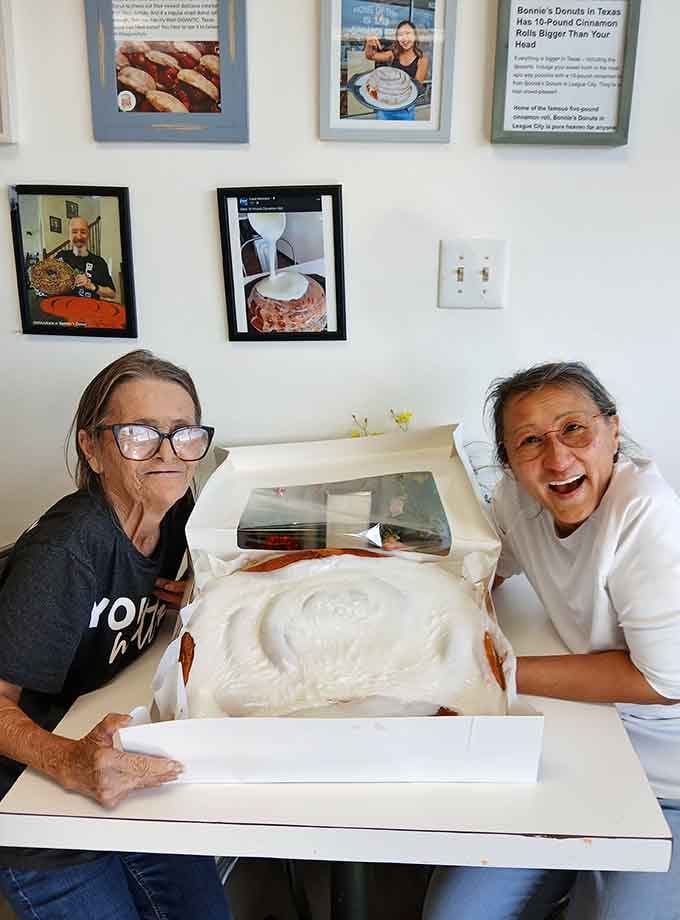 Pure joy captured in a single moment, because five-pound cinnamon rolls have that effect on people.