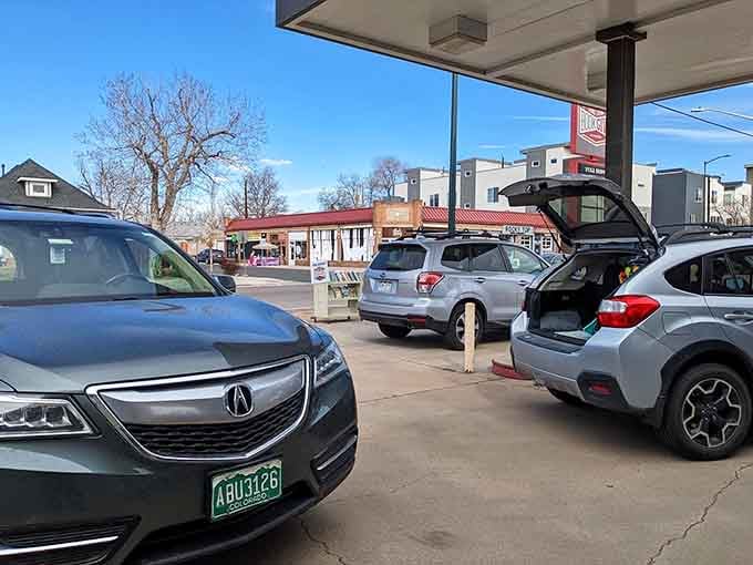 Cars lined up like it's Black Friday, except everyone's after books instead of discounted electronics and trampling strangers.