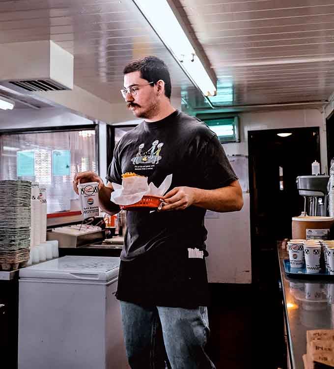 Behind every great burger is someone who knows exactly how to make it, one order at a time.