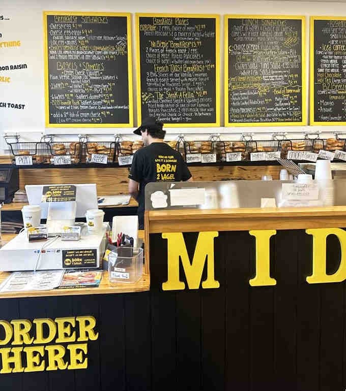 The command center where bagel orders transform from scribbles on paper into edible works of carb-loaded art.