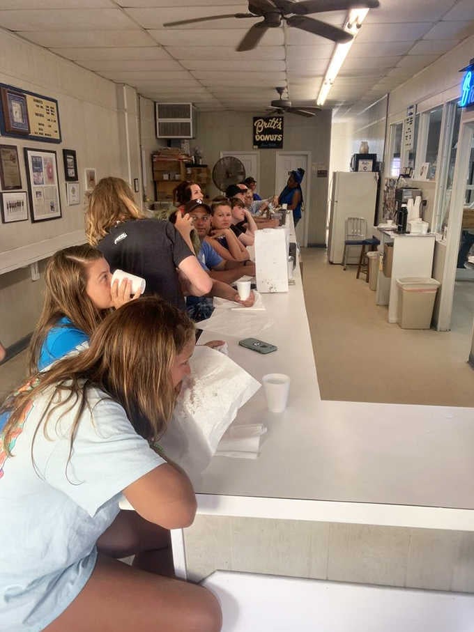 The counter stretches long and white, providing front-row seats to the greatest show on the boardwalk.
