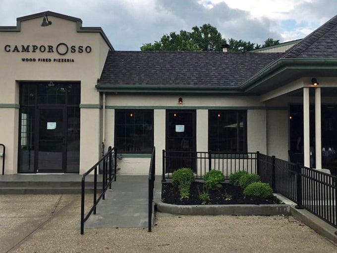 The entrance promises authentic Italian pizza, and unlike most promises these days, this one actually delivers.