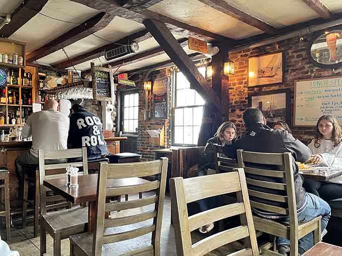 Real people enjoying real food in a real historic tavern, because authenticity never goes out of style.