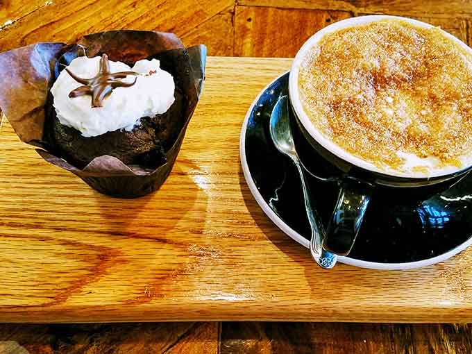 Coffee and a chocolate muffin creating the kind of duo that makes afternoon slumps completely manageable and almost enjoyable.