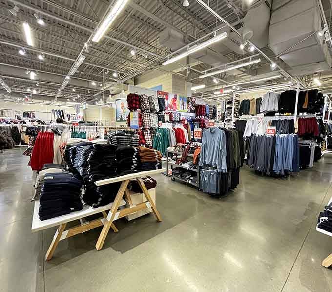 Mountains of sweaters and casual wear create a landscape of possibilities, where every color tells a different story waiting to be worn.