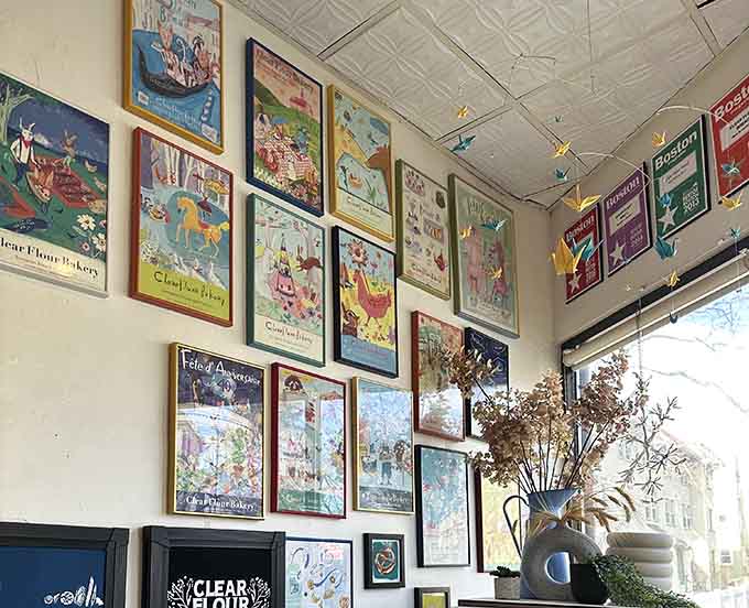 Vintage bakery posters adorning the walls, adding European charm to this beloved Brookline neighborhood treasure spot.