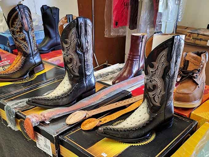 Cowboy boots lined up like leather soldiers, waiting to two-step their way into someone's wardrobe.