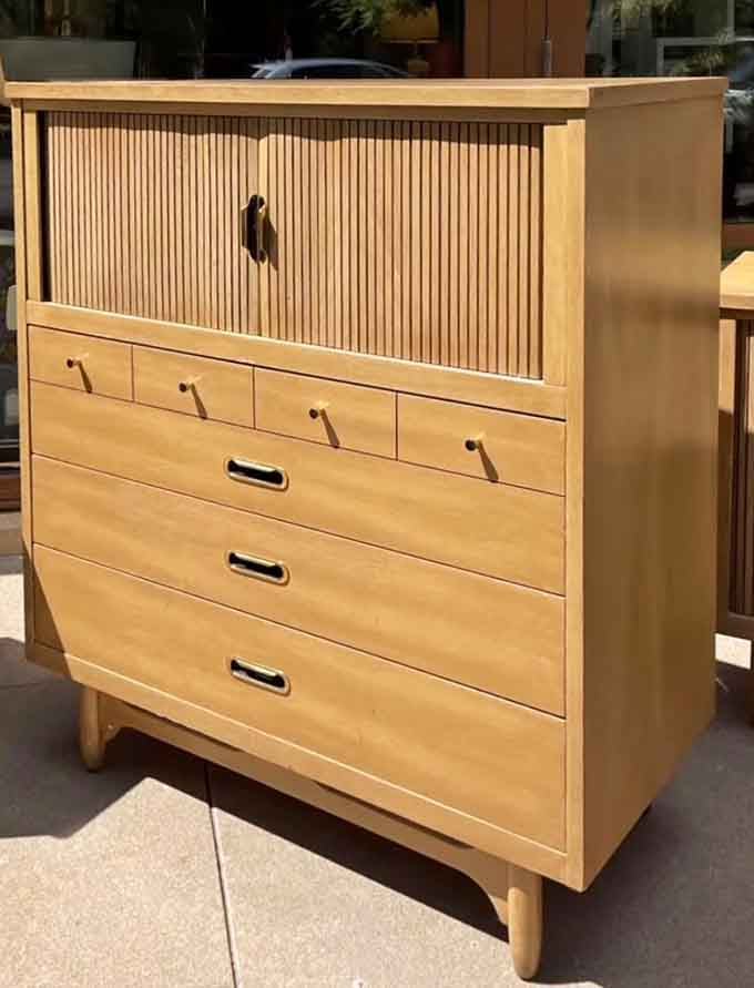 Mid-century chest of drawers with clean lines proving that 1960s furniture designers understood "less is more" before minimalism went mainstream.