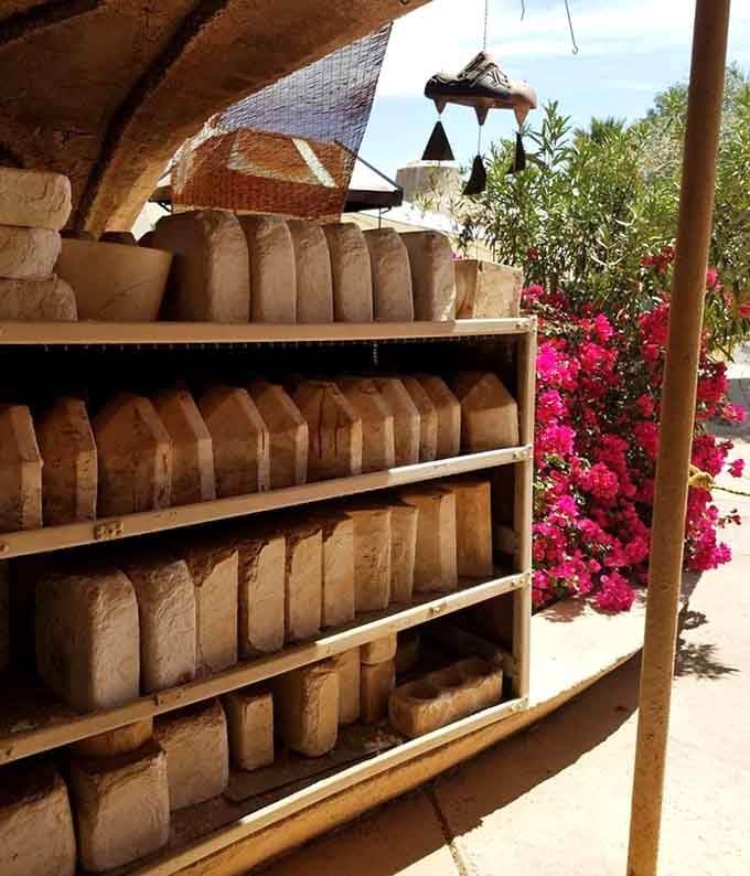 Rows of sand molds line the shelves like patient soldiers, each destined to birth something beautiful.