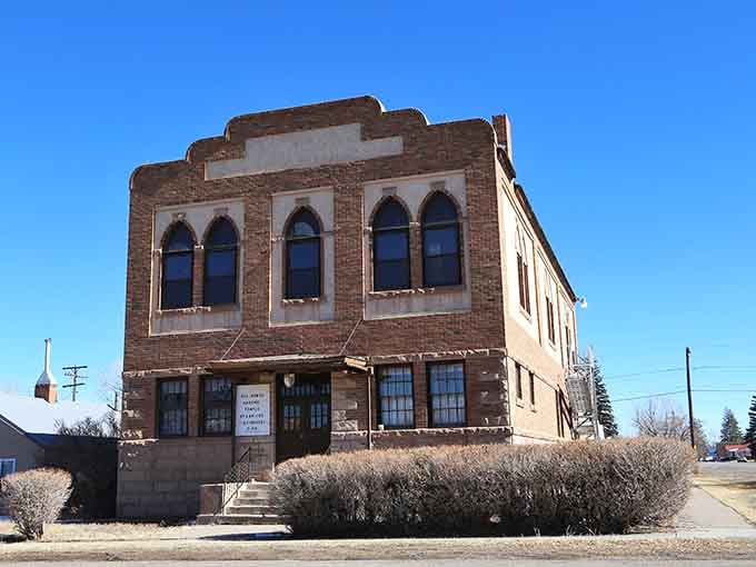 The Masonic Temple's brick facade and arched windows represent the kind of craftsmanship that modern construction forgot to remember.