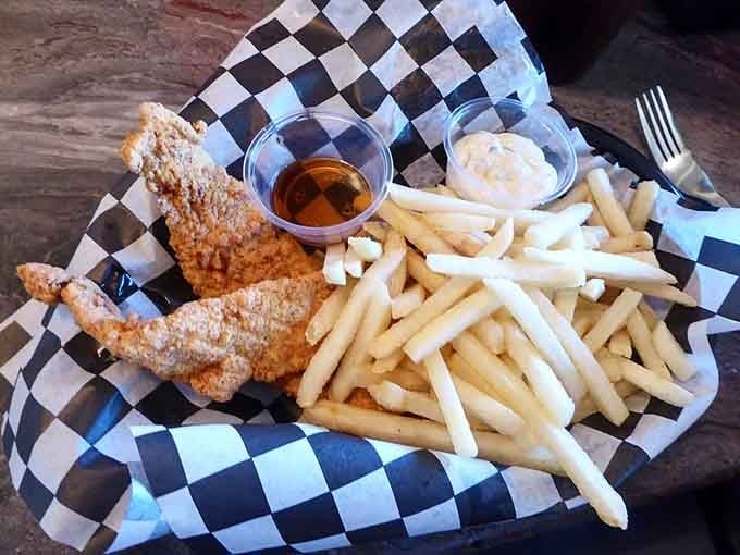 Crispy fish and fries in a checkered basket brings seaside vibes to the heart of Missouri somehow.