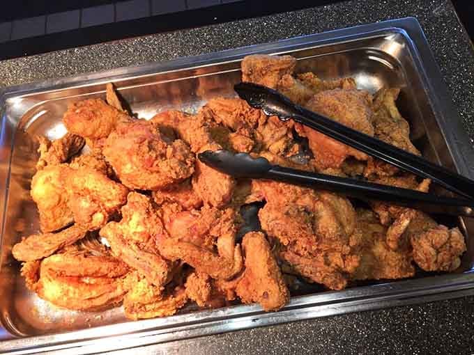 Fried chicken so perfectly golden it practically glows, waiting to make your taste buds sing with joy.