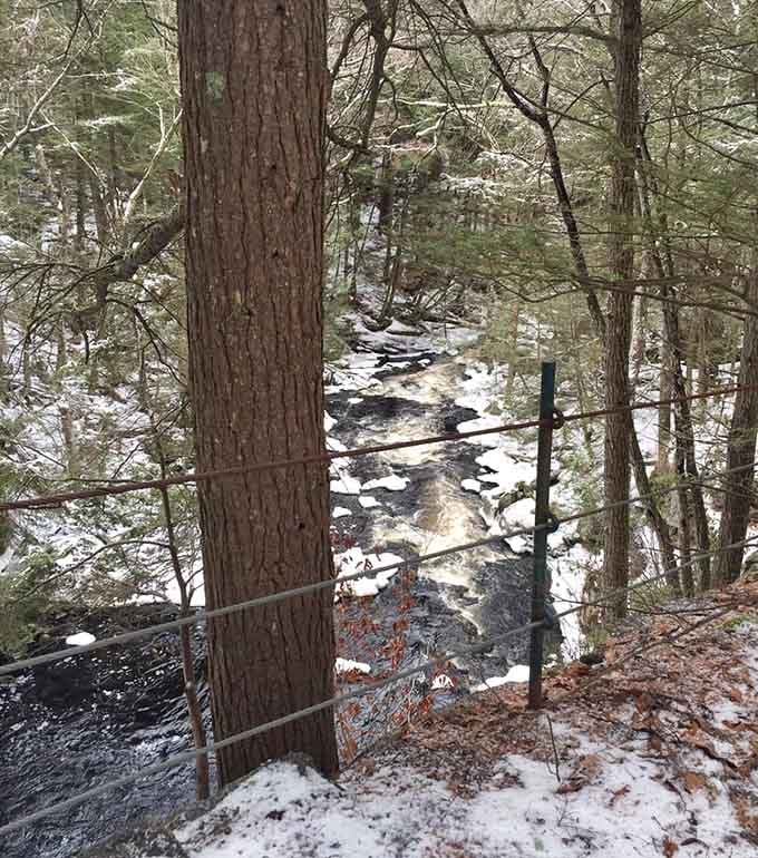 Snow-dusted trails leading to winter waterfalls create scenes worthy of any holiday card collection.