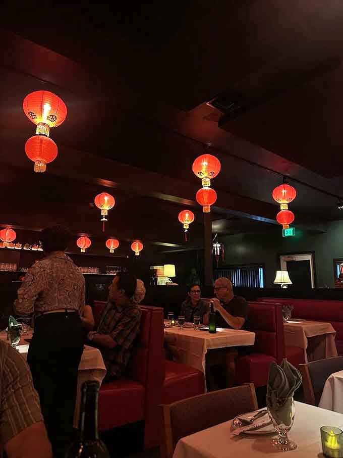 Real diners enjoying real food in this warmly lit space that makes every meal feel like a special occasion.