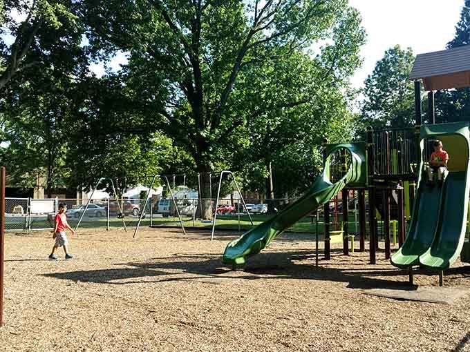 J.F.K. Playground echoes with laughter that reminds you childhood hasn't changed, just the technology kids ignore to play here.