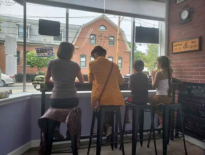 Window seating with a view, where lucky customers enjoy their treats while watching Brookline life unfold outside.