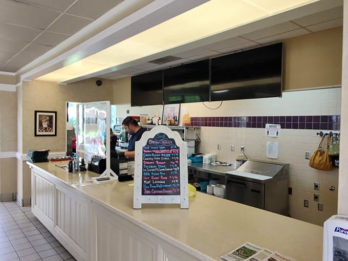 The order counter stands ready with a chalkboard of specials, where dreams of giant tenderloins become delicious reality daily.