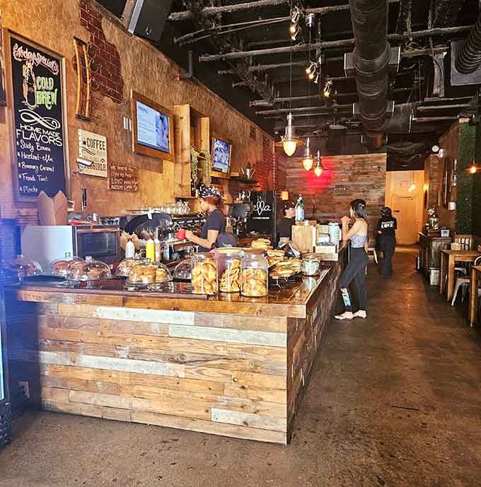 The counter where orders transform into experiences, staffed by people who understand coffee is serious business wrapped in friendly service.