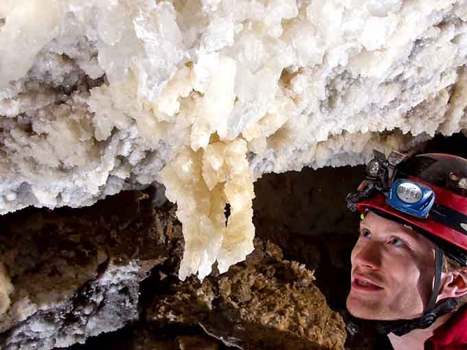 Cave formations sparkle like nature's own chandelier, proving Earth doesn't need electricity to create stunning displays.