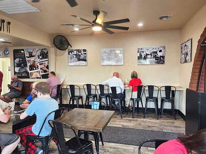 Black-and-white photos on the walls and metal chairs&mdash;casual dining at its finest, no pretense required here.