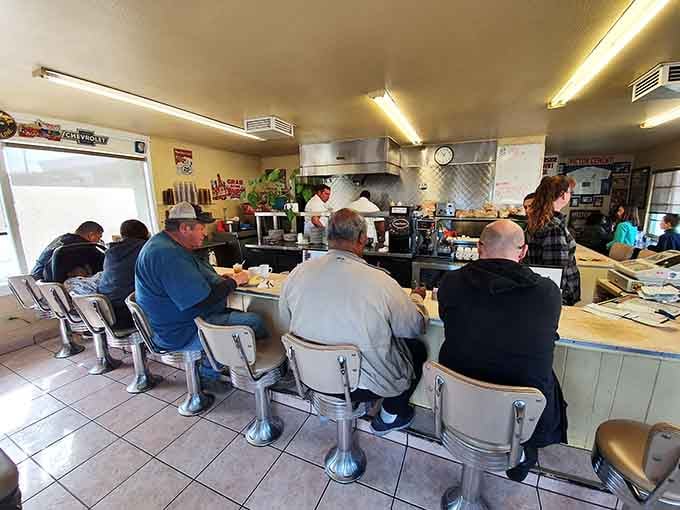 Locals and travelers united by chrome stools and excellent food, the great American diner equalizer in action.