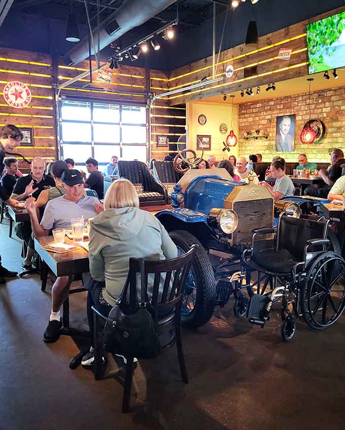 Real diners enjoying real food near a real vintage car creates the perfect trifecta of authenticity.