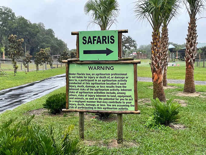 The safari sign's warning label is longer than most rental agreements, but considerably more important.