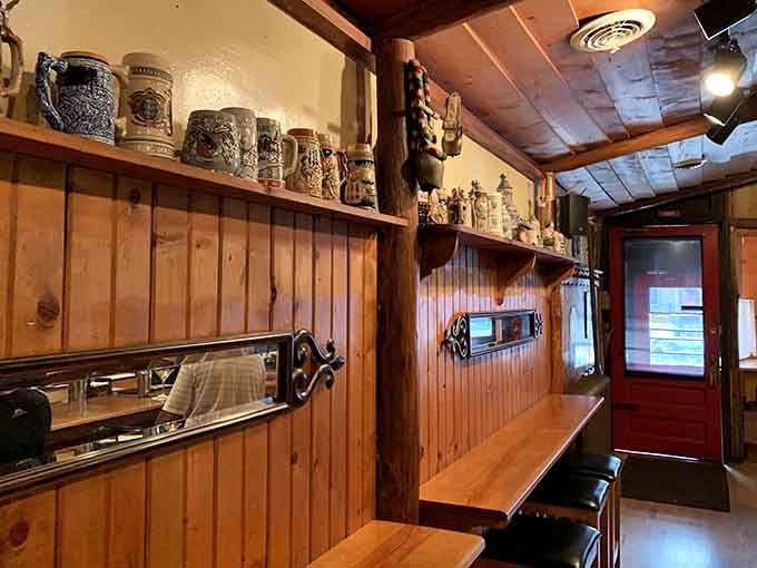 Traditional Swiss steins and decorative pieces line the shelves, creating atmosphere you simply can't fake or replicate.