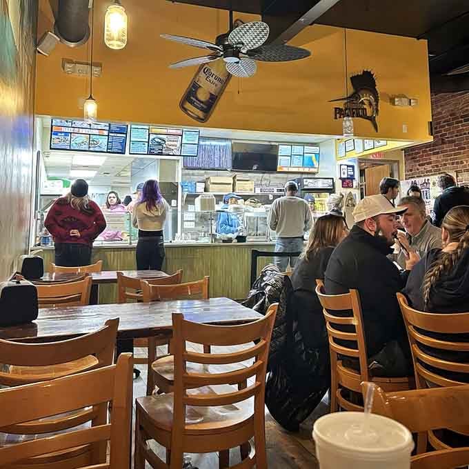 Happy diners prove that good food creates community, even in fast-casual settings.