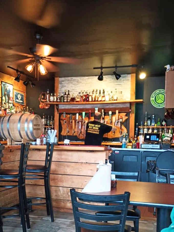 A well-stocked bar with bourbon barrels means they're serious about the complete barbecue experience here.