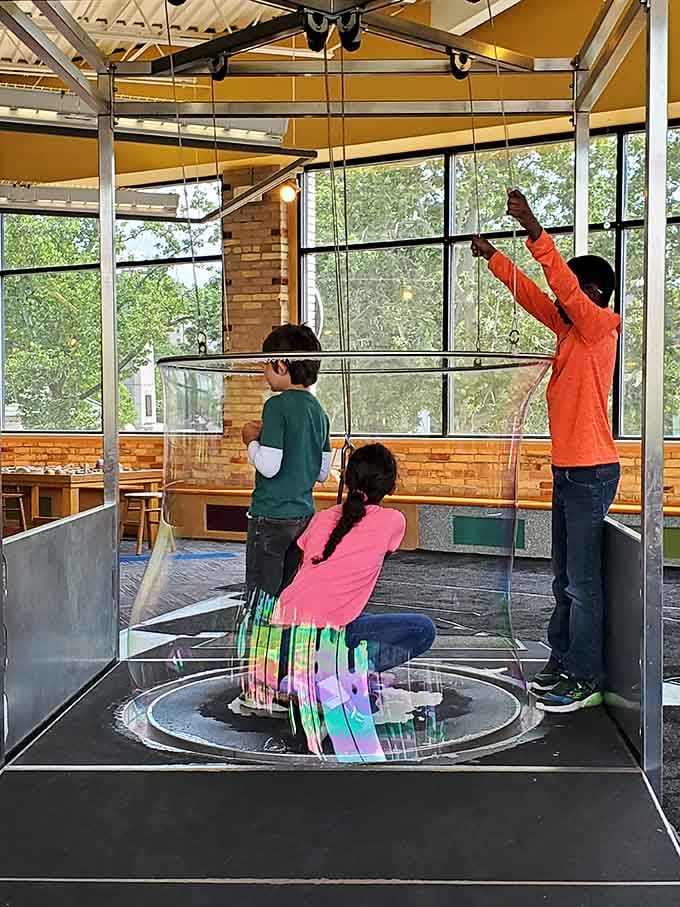 Giant bubble experiments demonstrate surface tension physics while kids think they're just playing with glorified dish soap and fun.